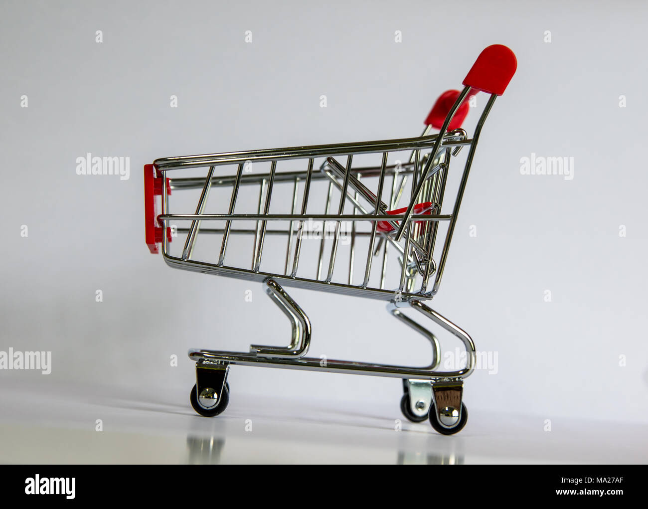 MIni cart on white background Stock Photo - Alamy