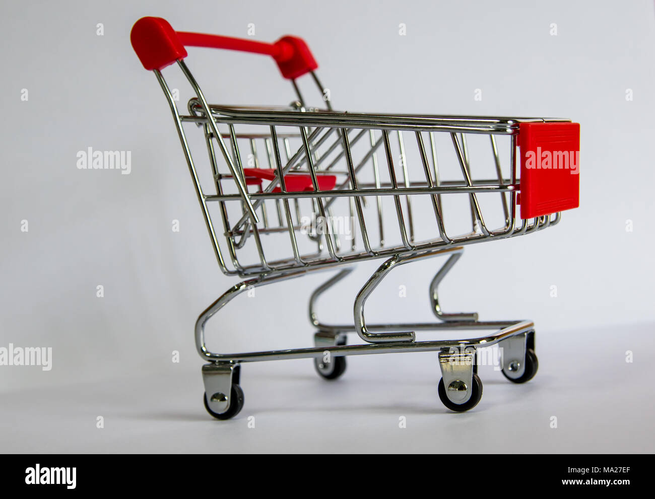 MIni cart on white background Stock Photo - Alamy