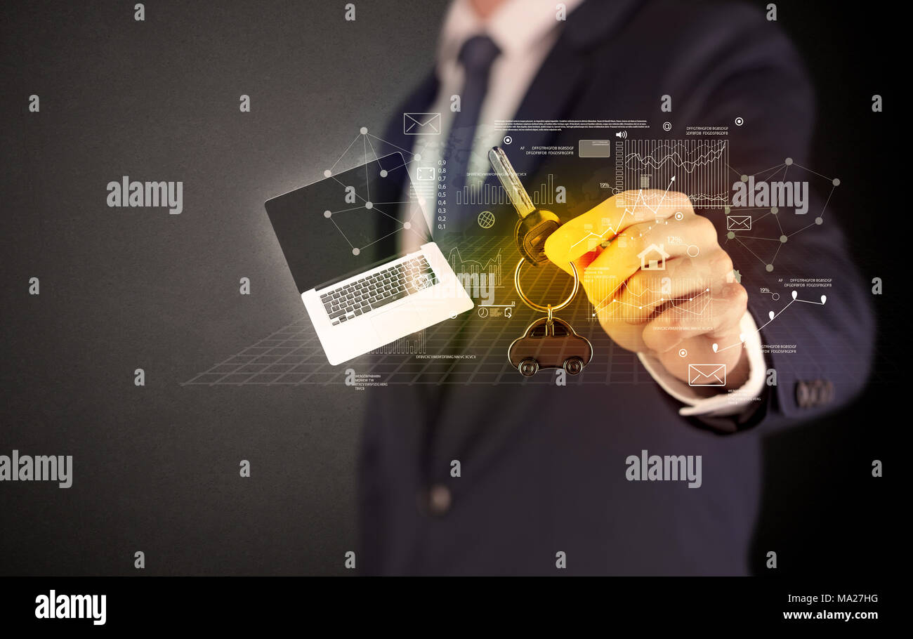 Businessman in suit holding keys with statistics, graphs and icons ...