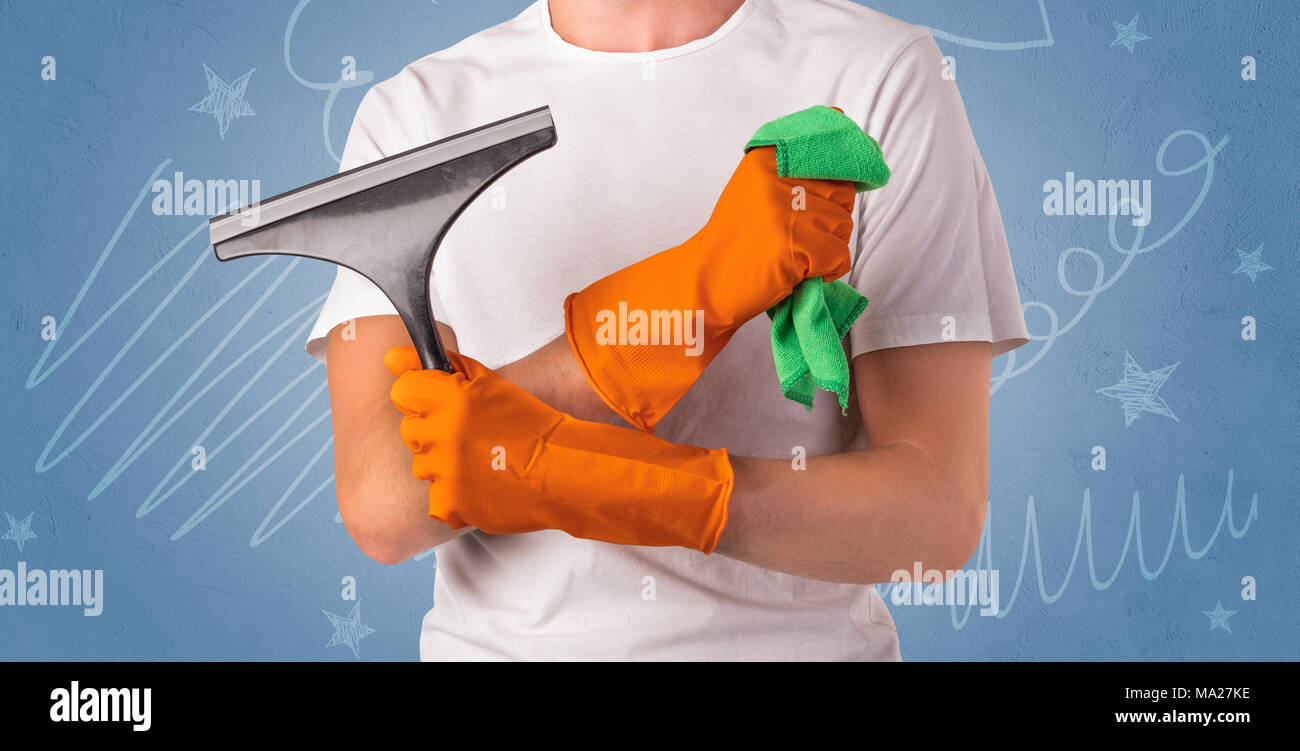 Swabber with orange rubber gloves and doodle concept on wallpaper Stock ...