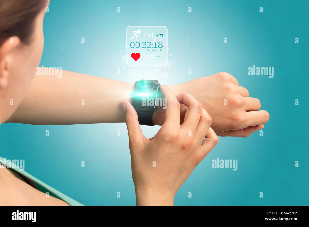 Female hand with smartwatch and running concept above Stock Photo - Alamy