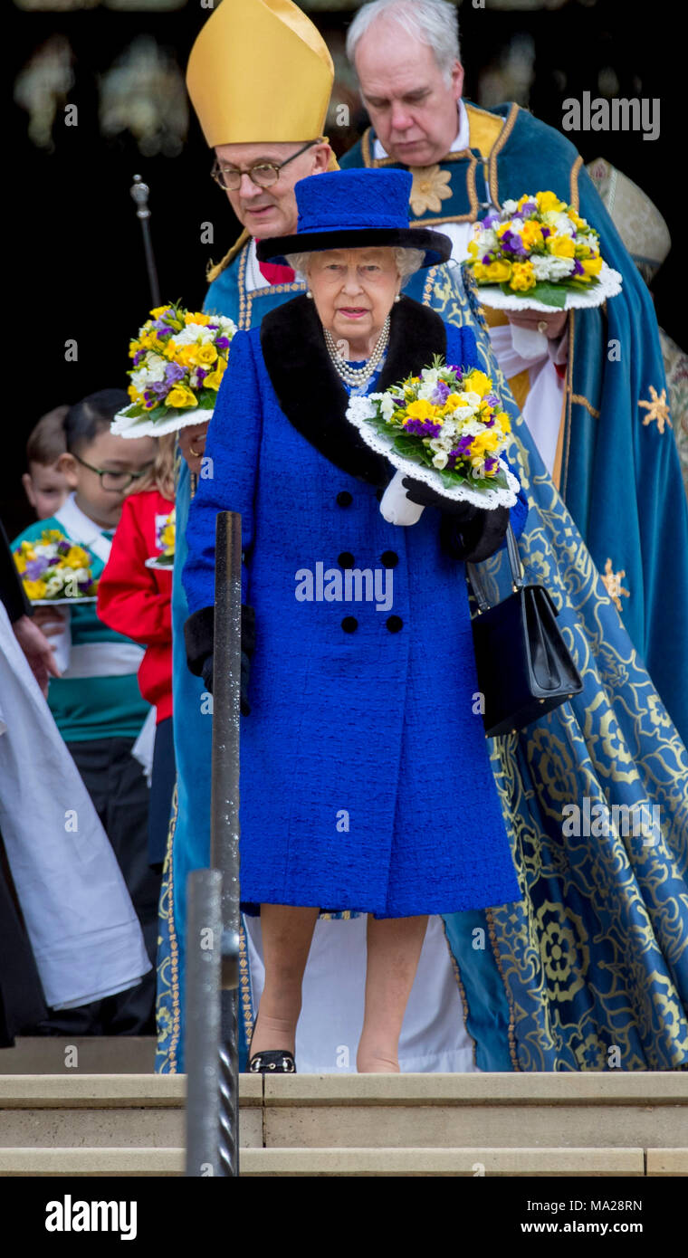 Queen Elizabeth II holding a nosegay outside St George's Chapel in ...