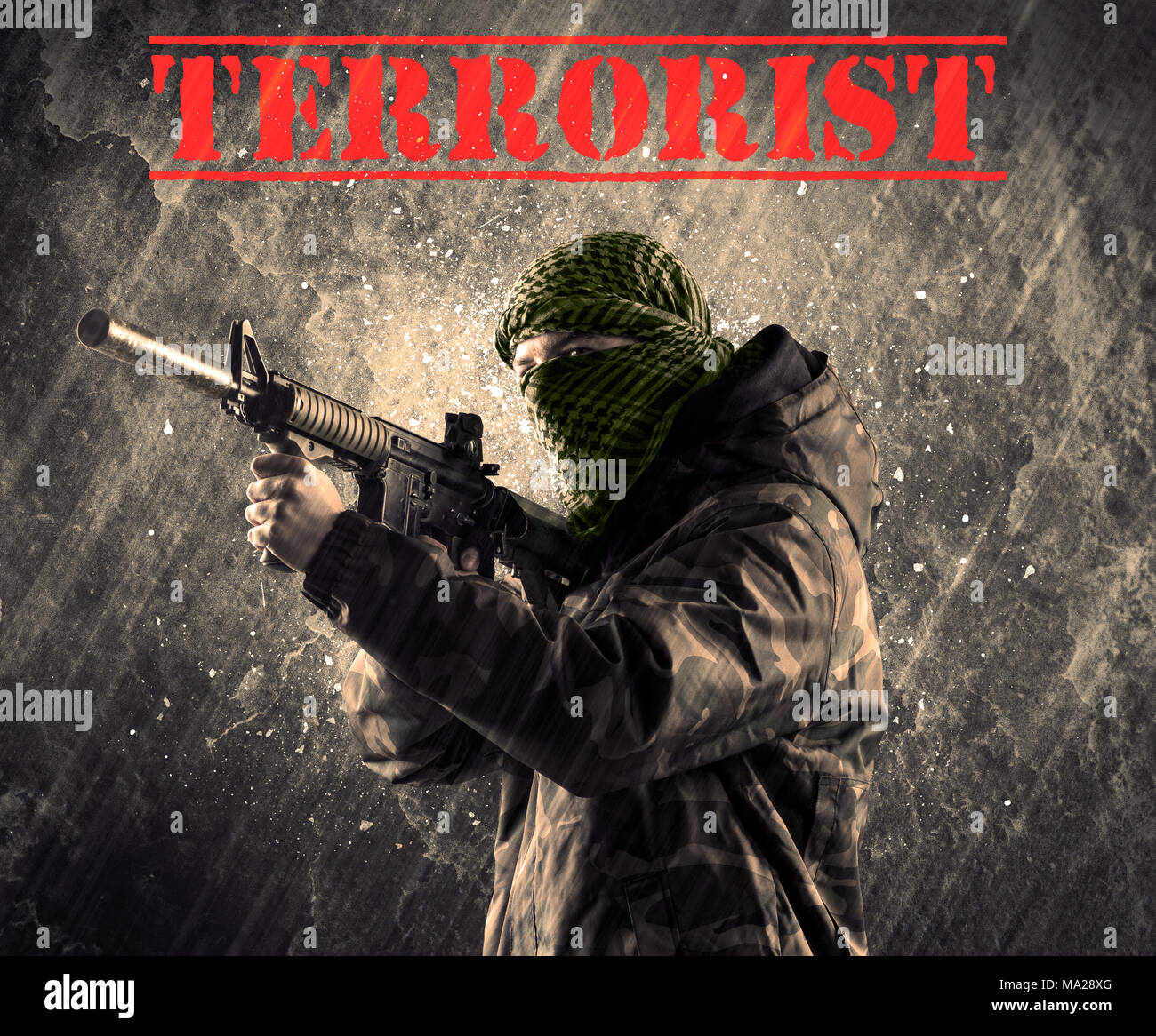 Portrait of dangerous masked and armed man with terrorist sign on ...