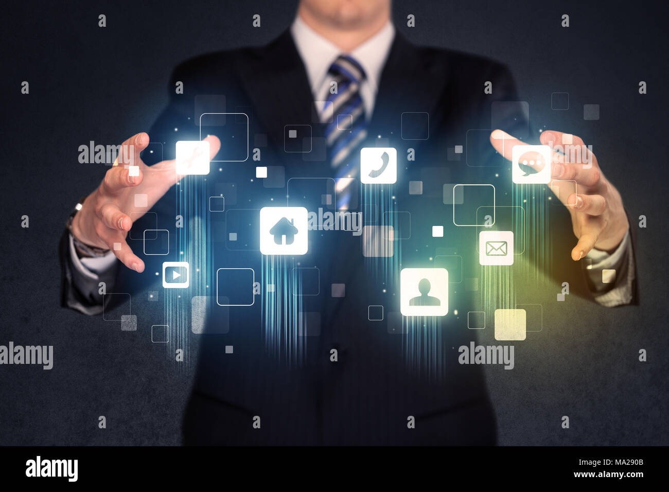 Blue social application icons in the hands of a businessman Stock Photo ...