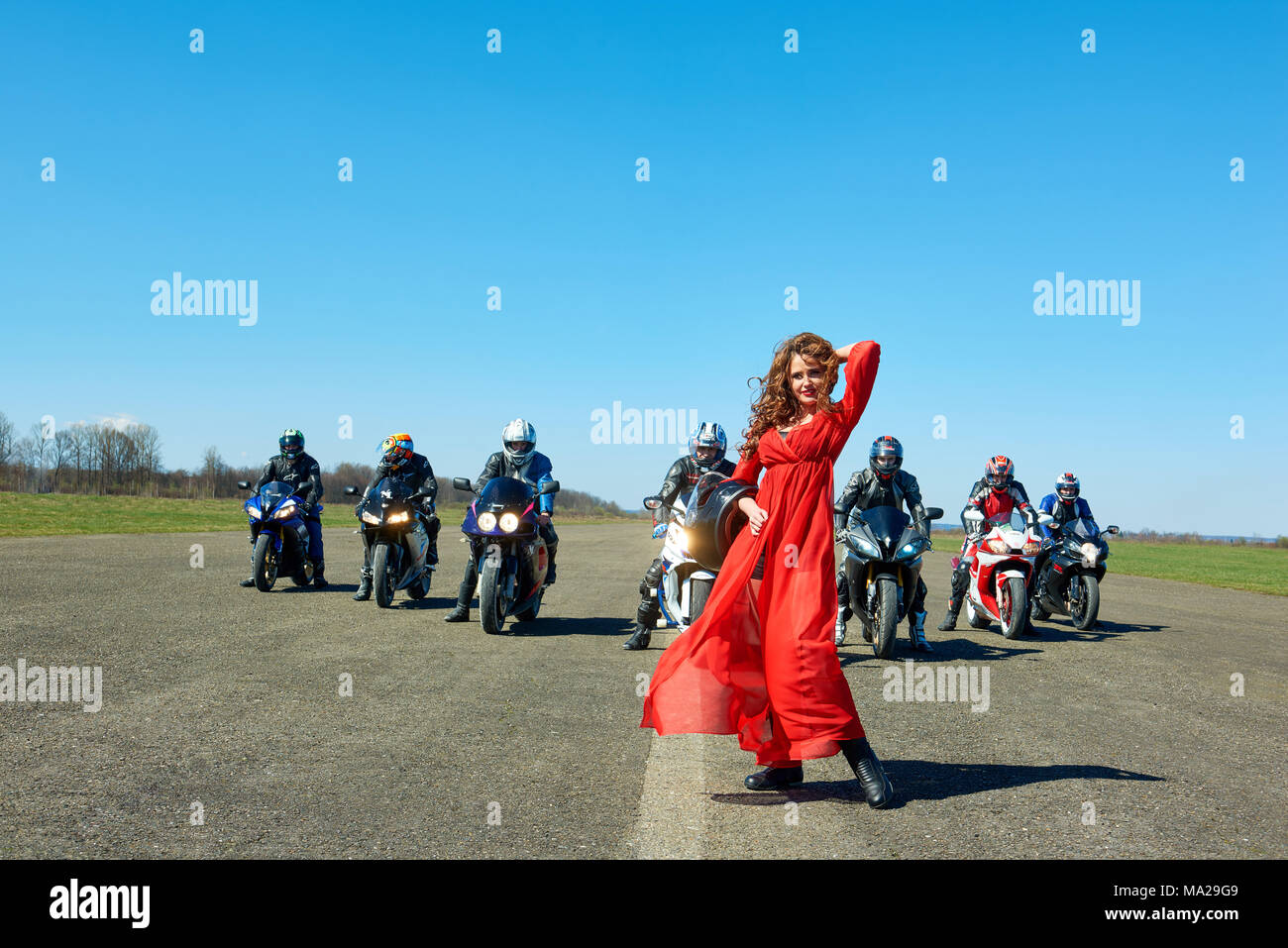 Kiev, Ukraine - 29 March 2017: Young woman in dispersing red dress is ...