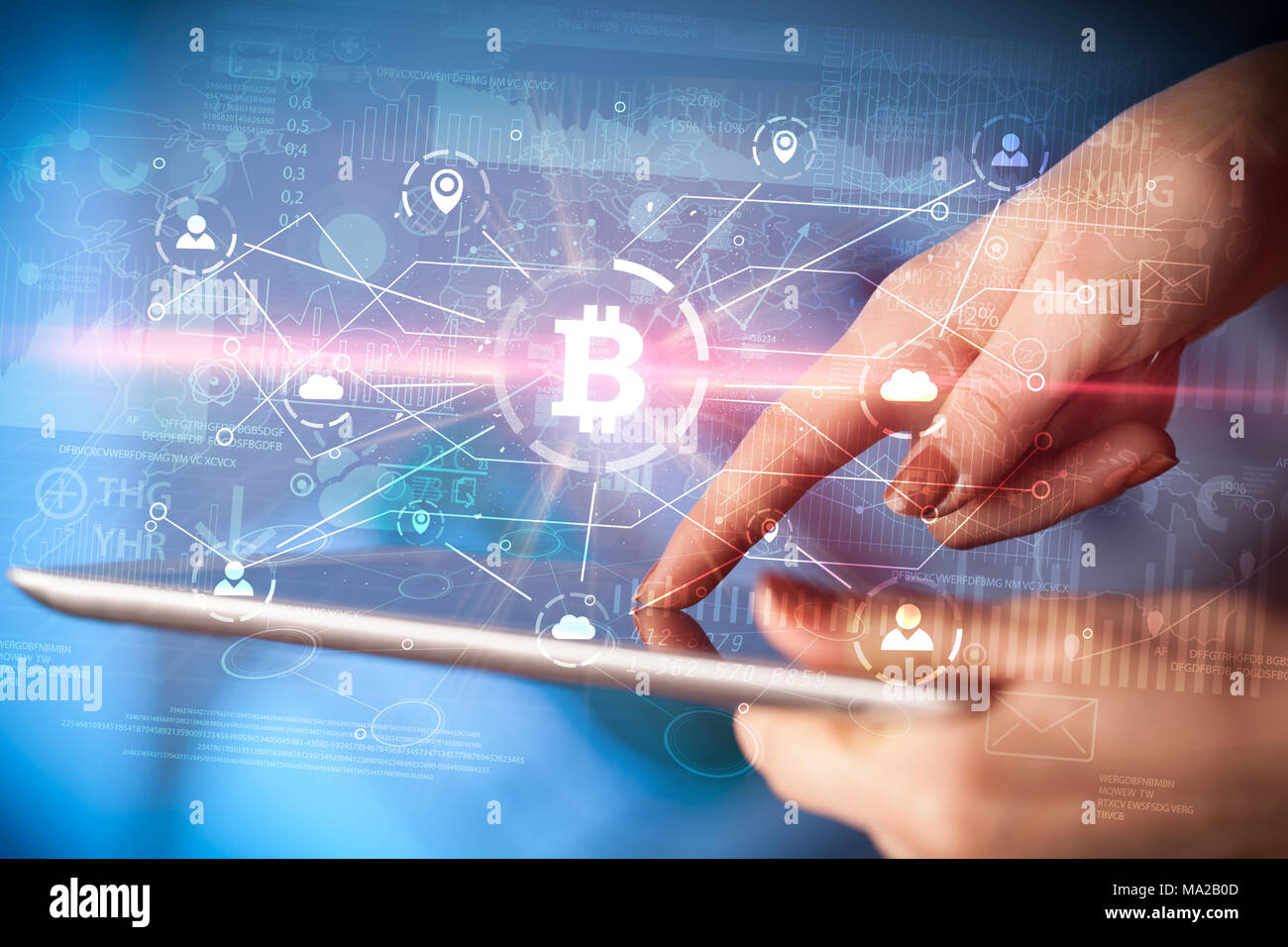 Hand using tablet with cryptocurrency bitcoin link network and online ...