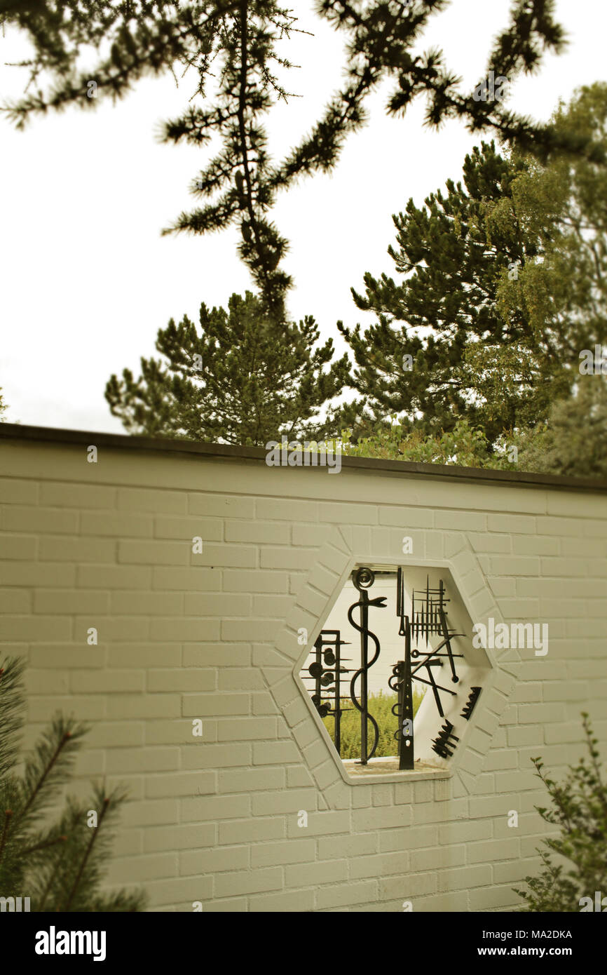 Hexagon shaped window in wall at Planet un Blomen Park, Hamburg ...