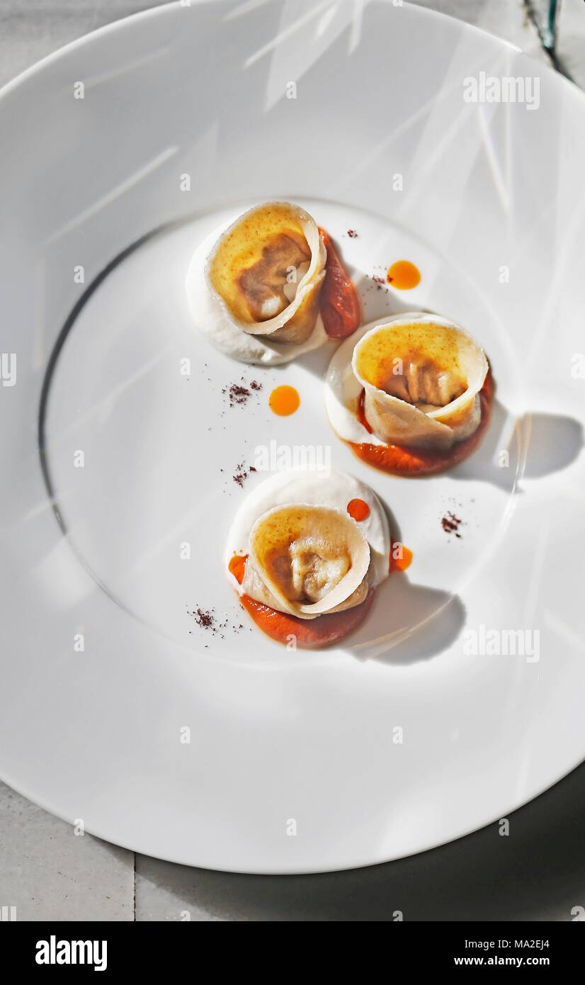 Manti, pastry parcels filled with lamb and smoked yoghurt Stock Photo ...