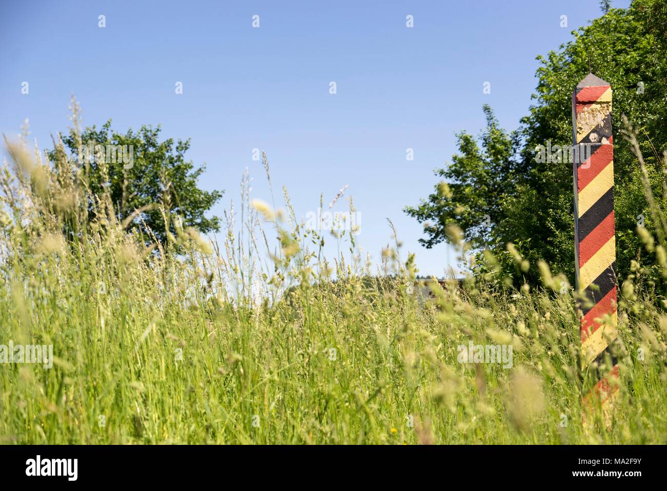 An old border post at the border triangle Stock Photo - Alamy