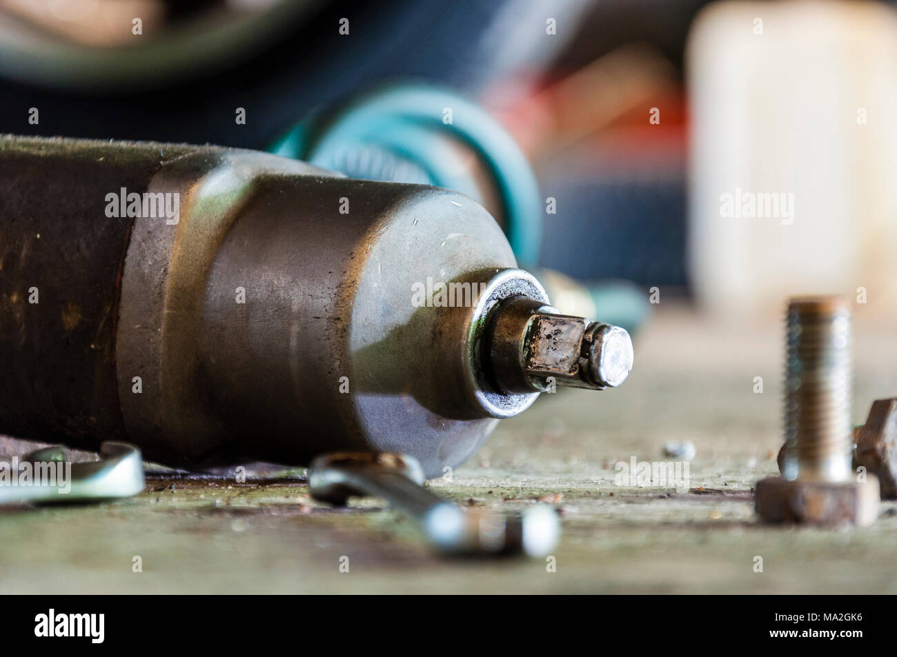 Greasy compressor screwdriver wrenches and bolts Stock Photo - Alamy