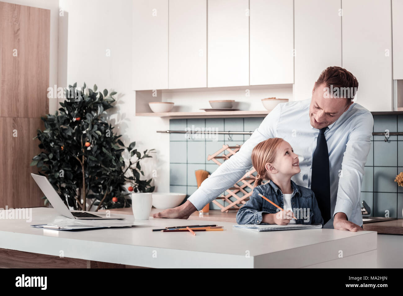 In all ears. Happy girl keeping smile on her face and raising head ...