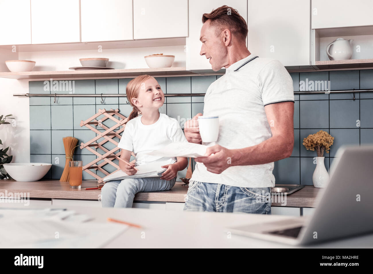 Happy child smiling to her daddy Stock Photo - Alamy