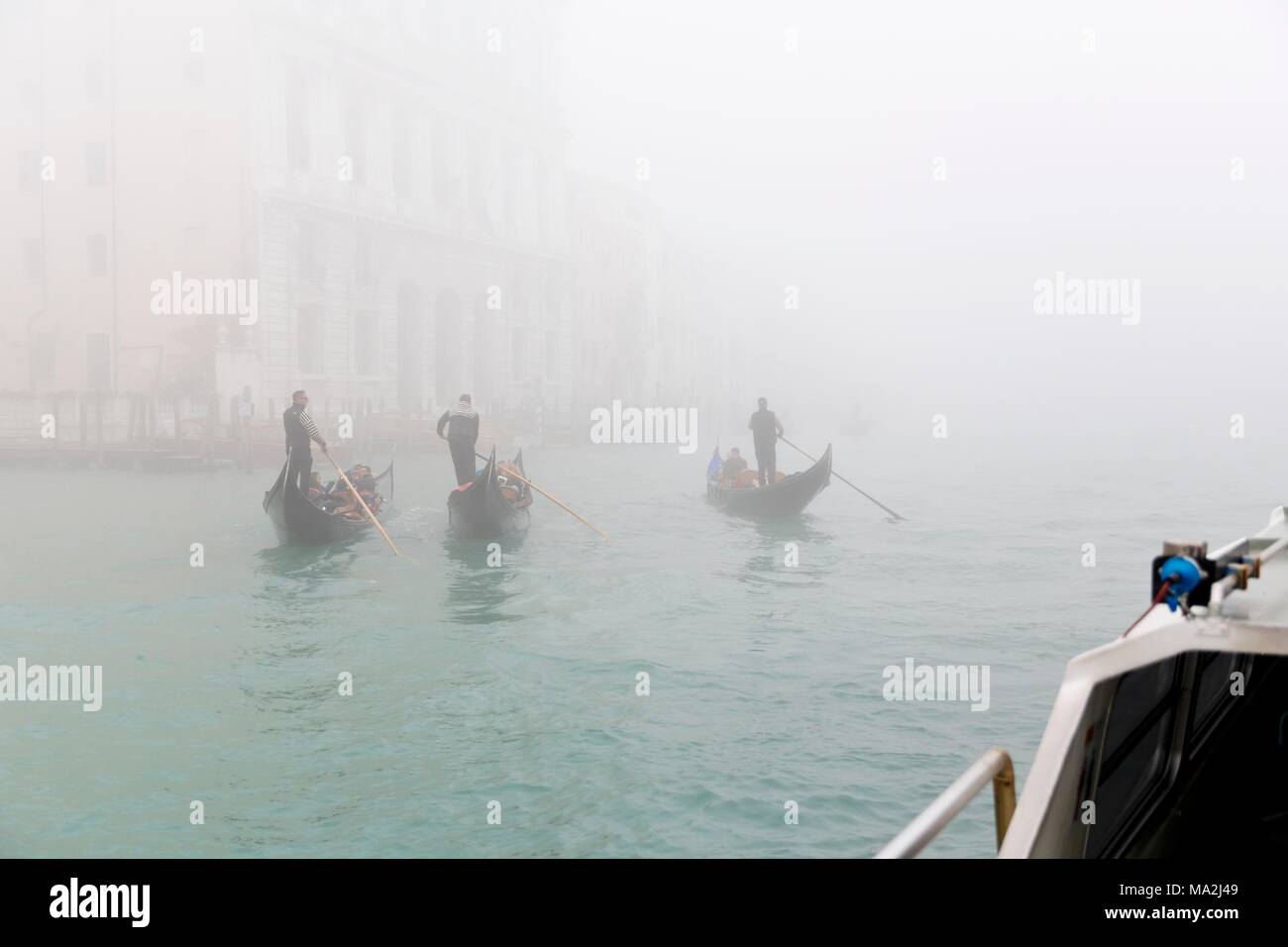 A spooky scene of gondolas in the fog, Venice, Italy Stock Photo - Alamy