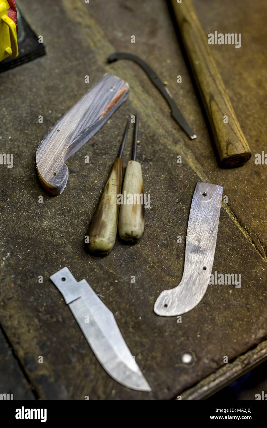 Knives being made in an Italian knife factory Stock Photo - Alamy