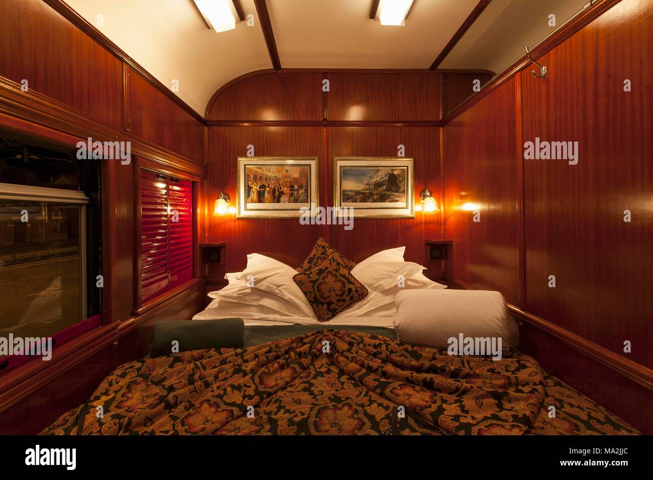 A bed in a suite in the luxury train Rovos Rail (journey from Durban to ...