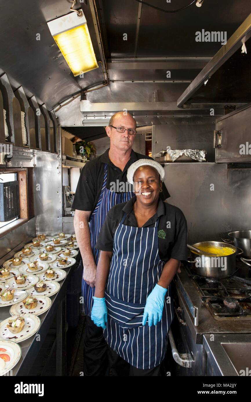 A cook and the head chef in the kitchen of the luxury train Rovos Rail ...
