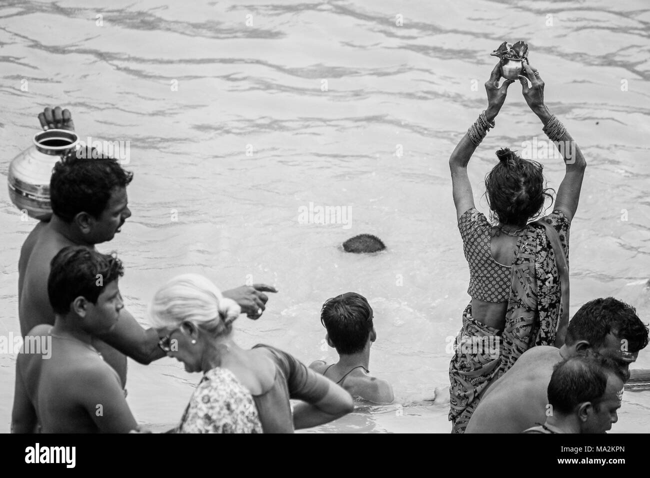 An Indian woman showing respect to river Ganga Stock Photo - Alamy