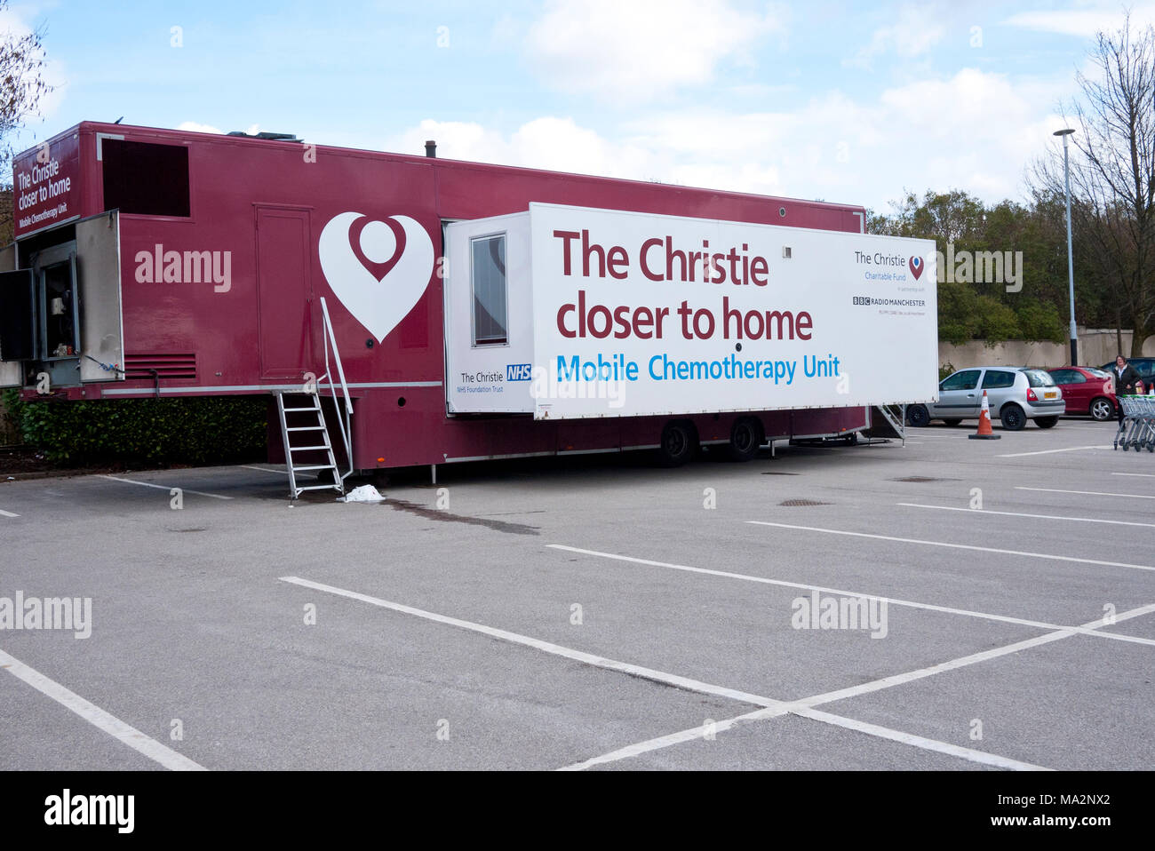 The Christie mobile Chemotherapy unit parked on a supermarket car park ...