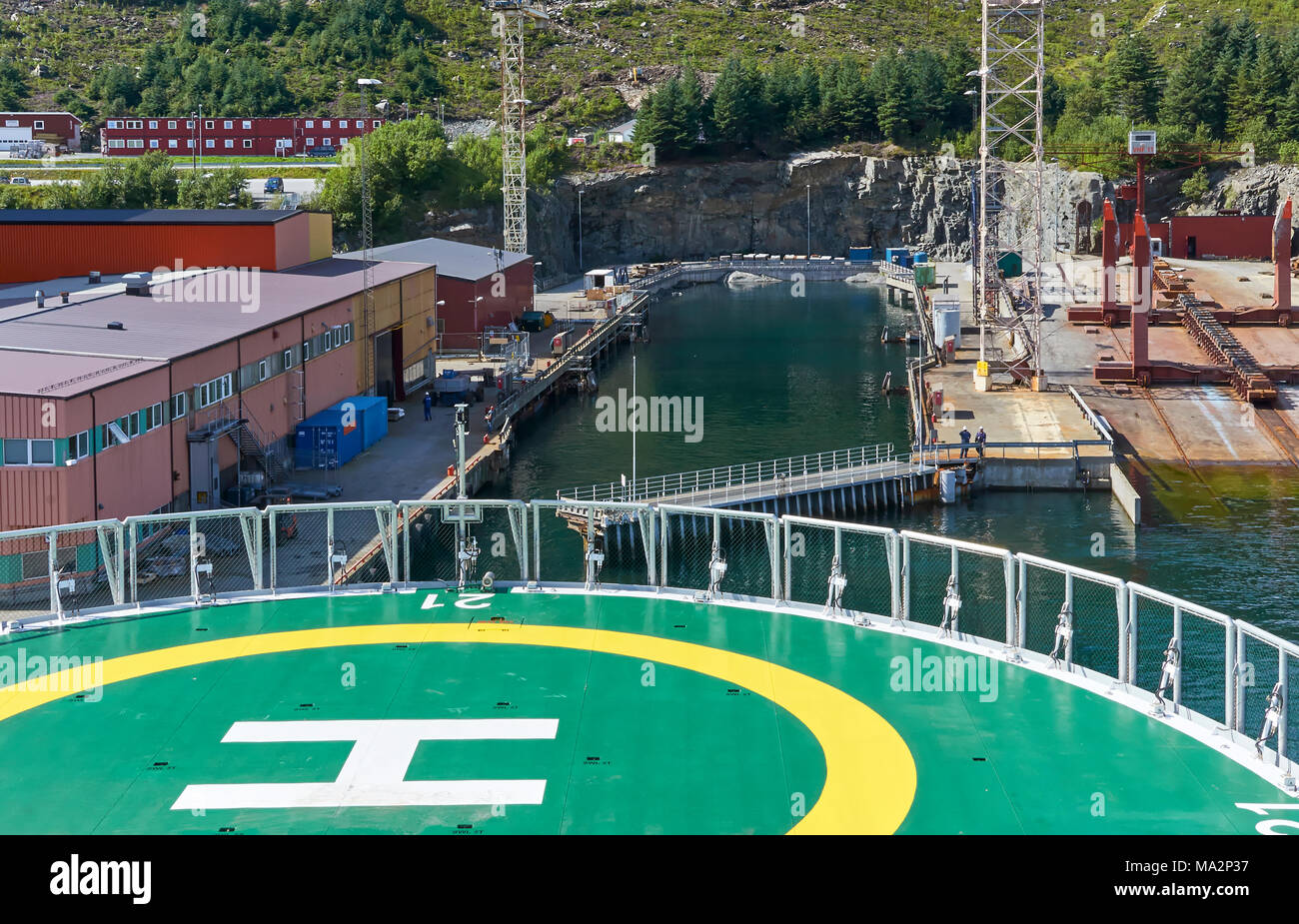 The Oceanic Endeavour slowly reversing out of the water filled Dry Dock ...
