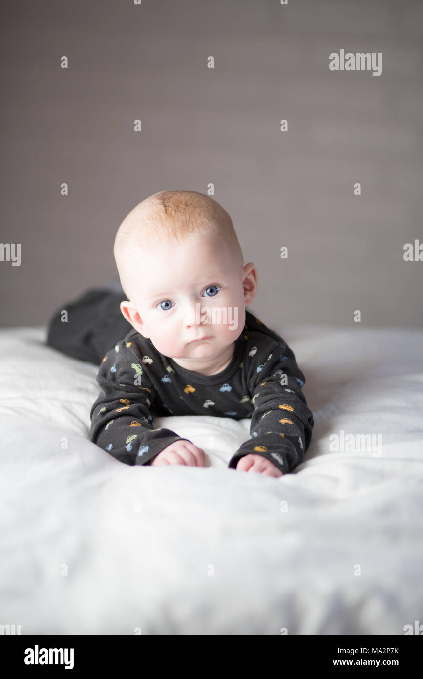 Portrait of cute baby boy with a sincere expression Stock Photo - Alamy