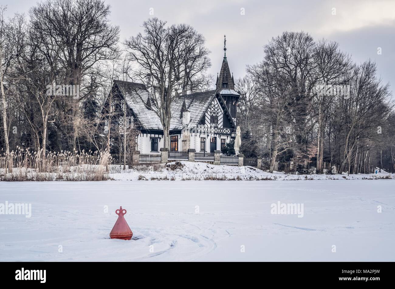 Beautiful historic castle in a winter scenery. Historic Hunting Palace ...