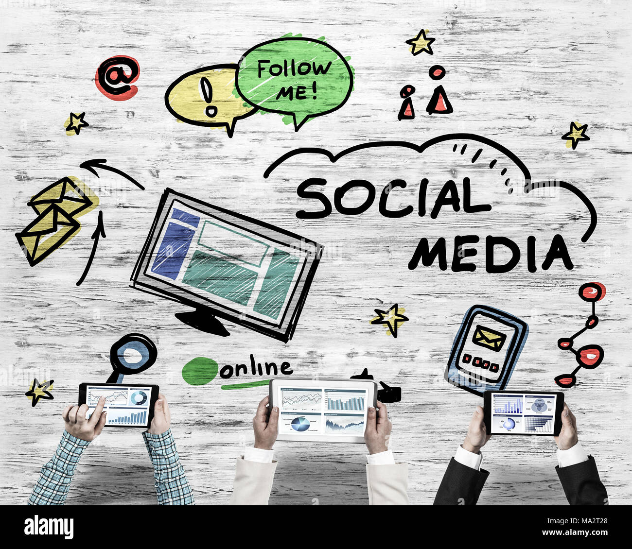 Group of three people with devices in hands working together as symbol ...