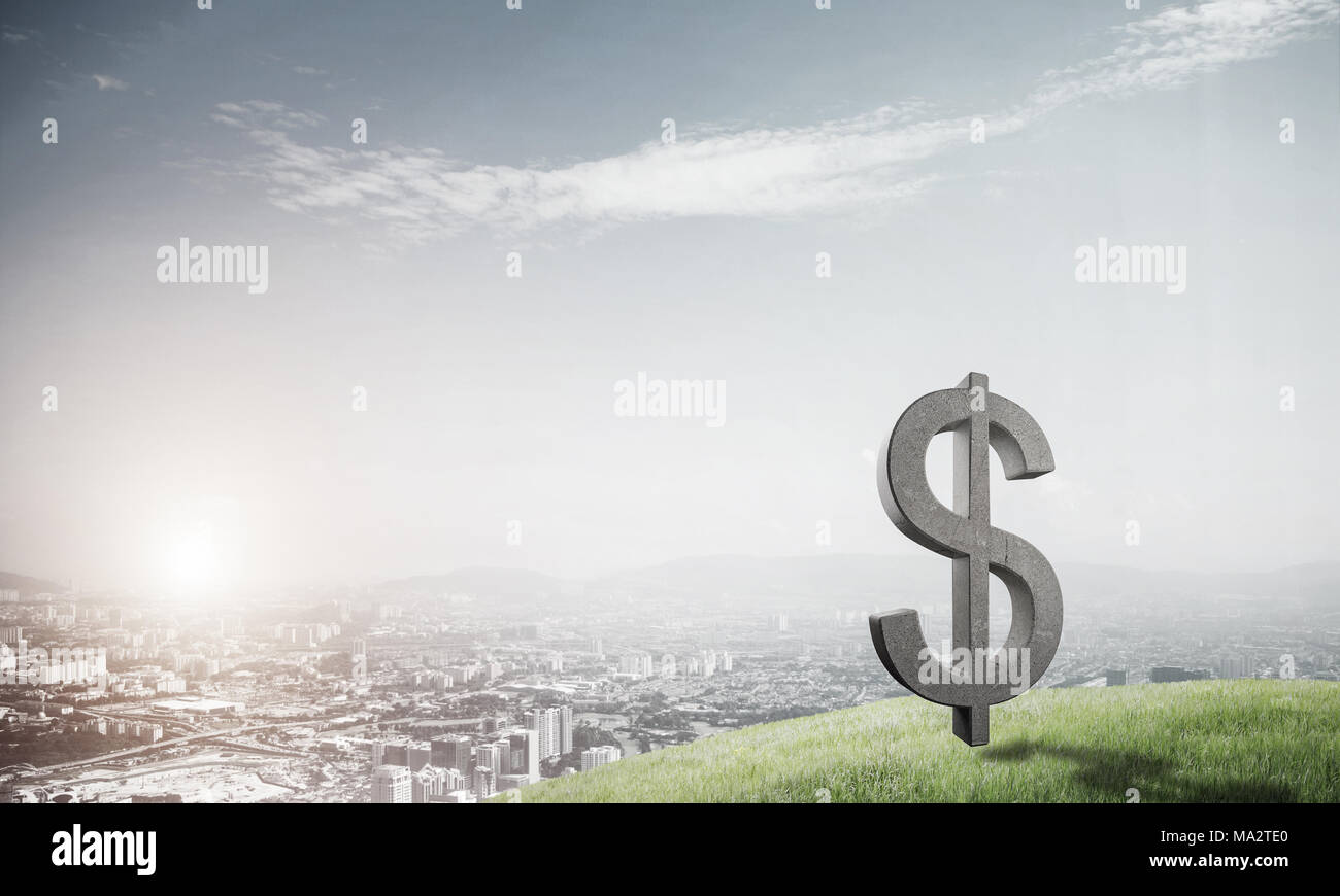 Stone dollar symbol outdoors on green hill as currency sign Stock Photo ...