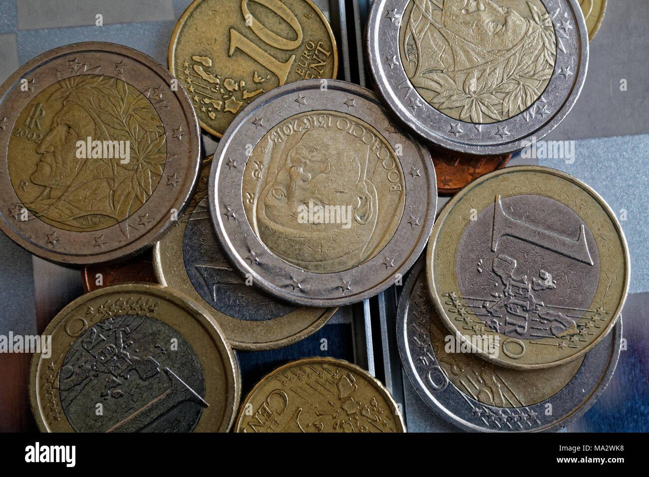 Pile of Euro coins lies in mirror reflect wallet lies Stock Photo - Alamy