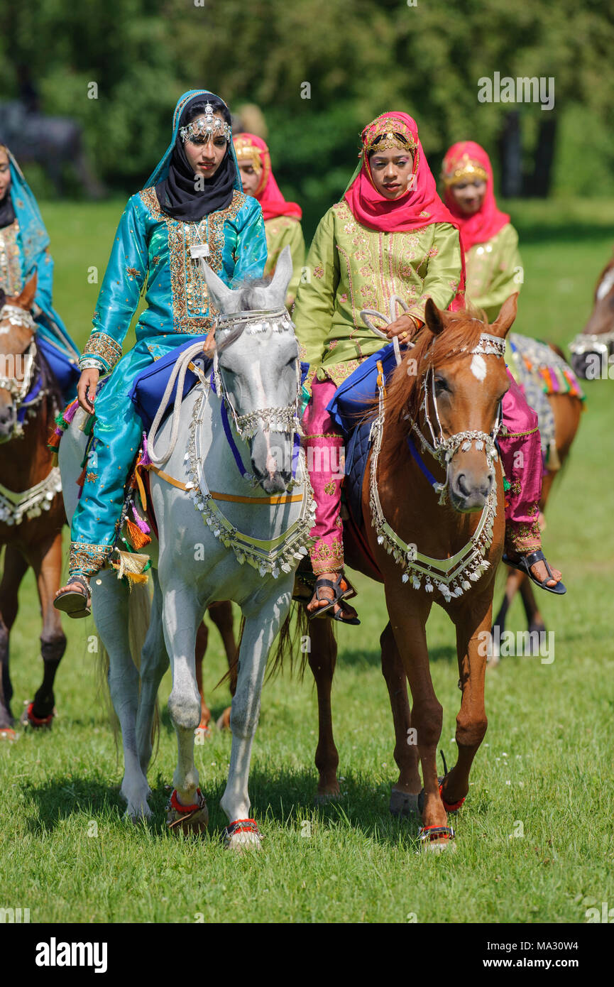 Members of the Arab show group "Royal Cavalry of Oman" ride in ...