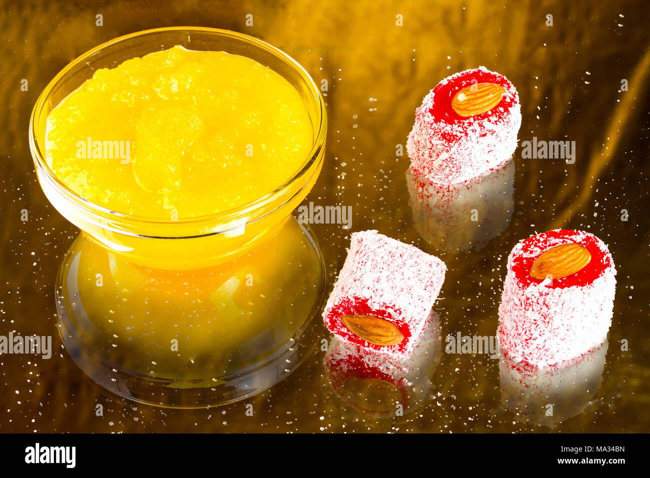 honey, rakhat-lukum sprinkled with coconut shavings and almond on ...