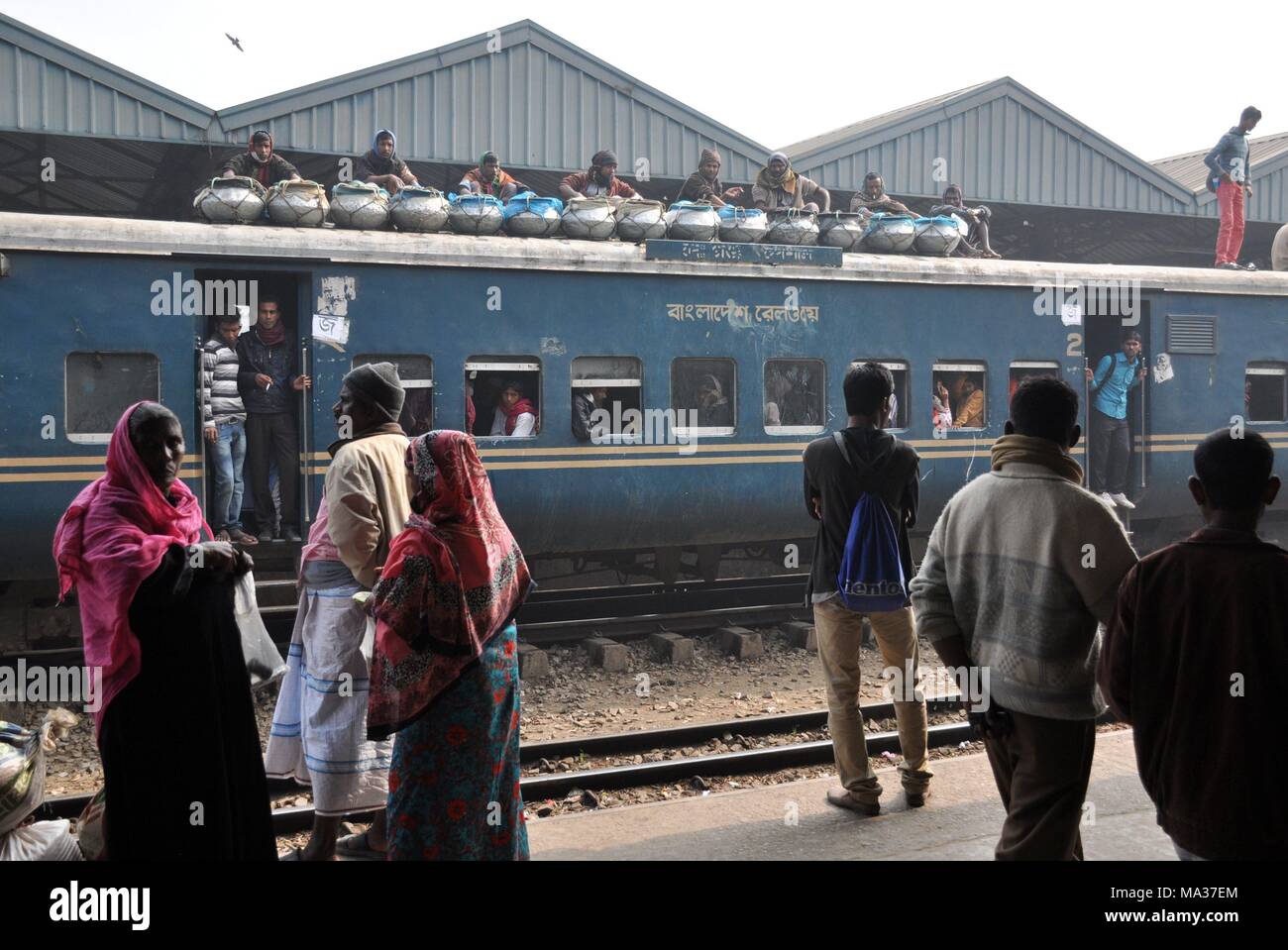 Passengers on the roof of a train in the station Tongi near Dhaka on 09 ...