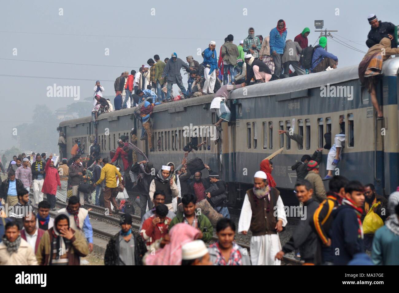 Crowded passenger train in the station Tongi near Dhaka on 09.01.2015 ...