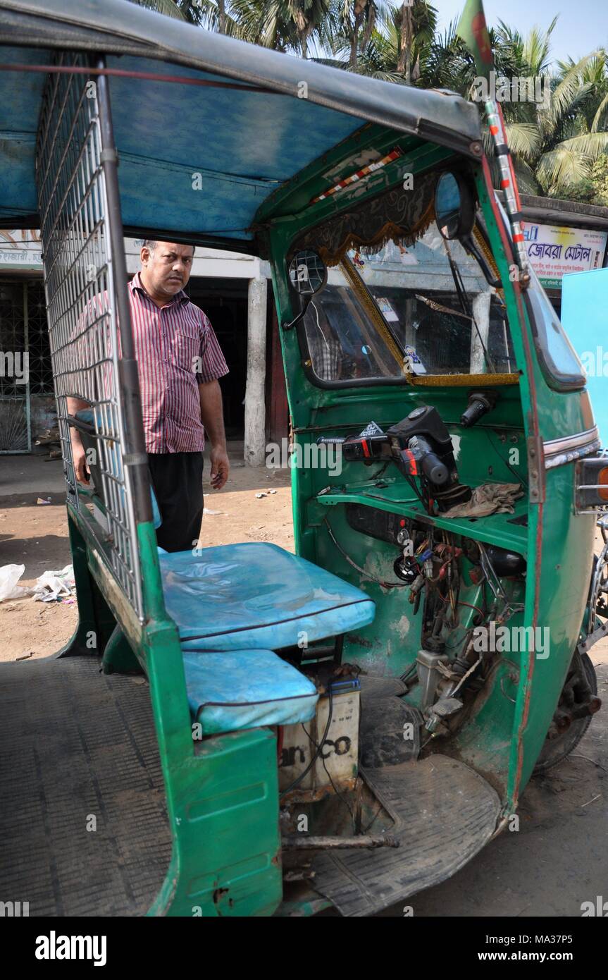 Driver and his motor rickshaw on 17.01.2015 at Chittagong - Bangladesh ...