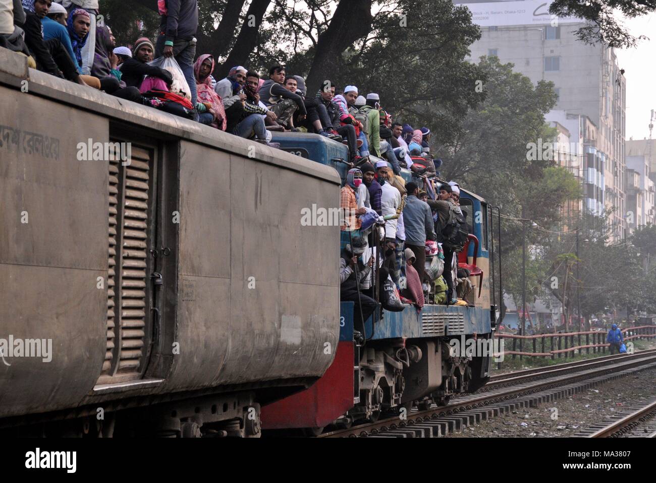 Overcrowded train with people on the roof on 18.01.2015 in Dhaka-Banani ...