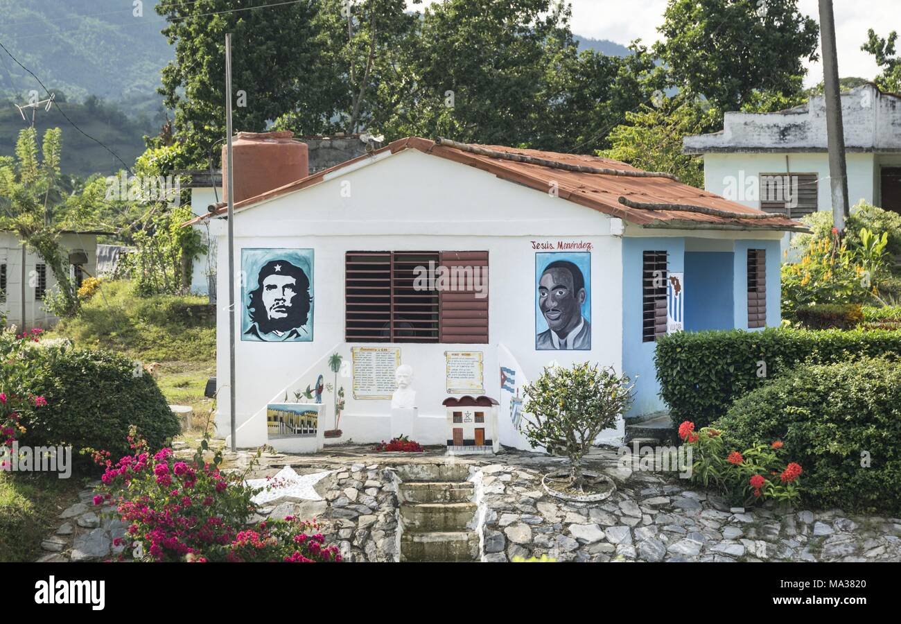 On the facade of a small administrative building in central Cuba, the ...
