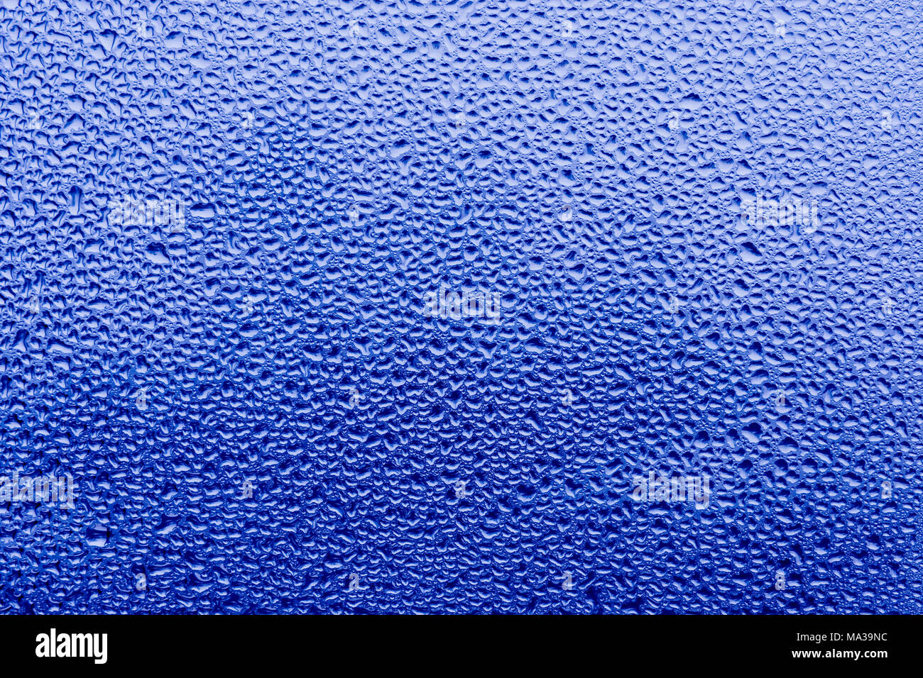 texture background wet drops of water dew on misted glass mist Stock ...