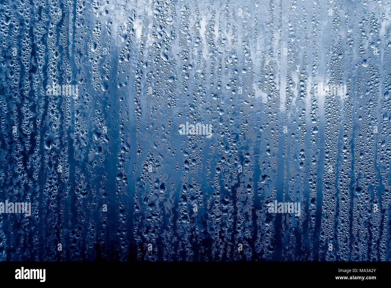 texture background wet drops of water dew on misted glass mist Stock ...