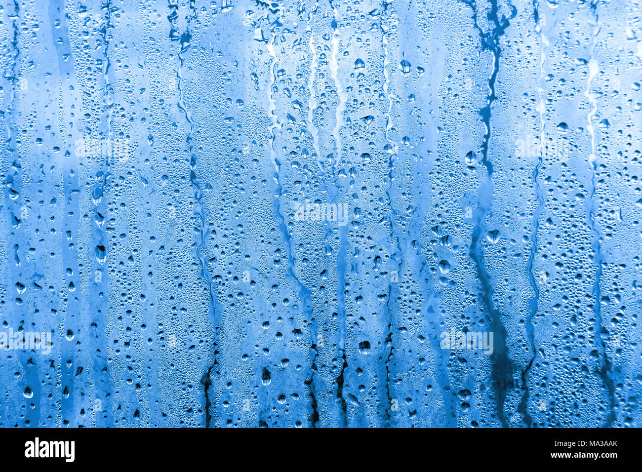 texture background wet drops of water dew on misted glass mist Stock ...