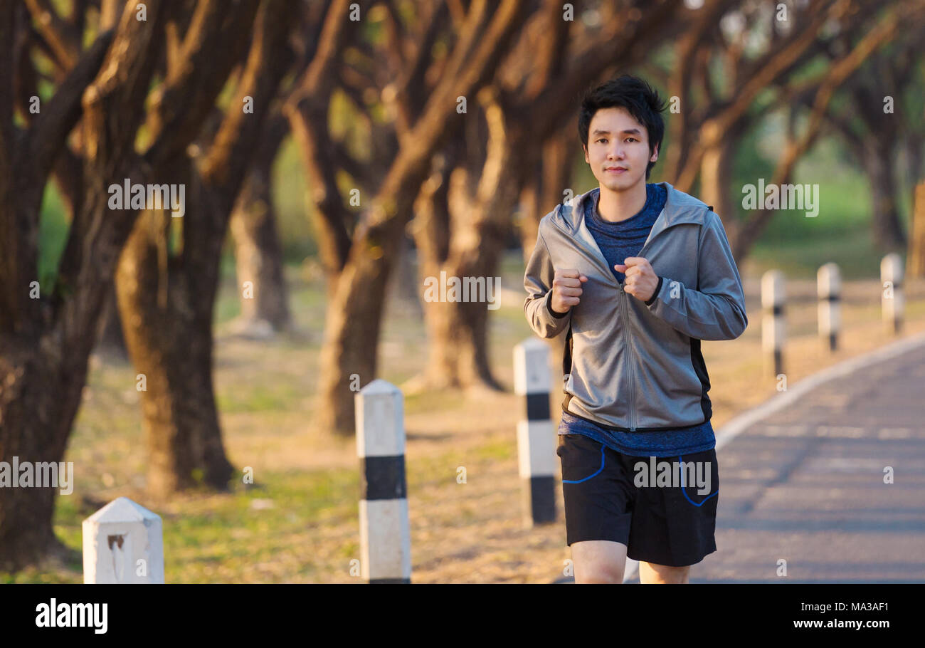 fitness man running in the park Stock Photo - Alamy