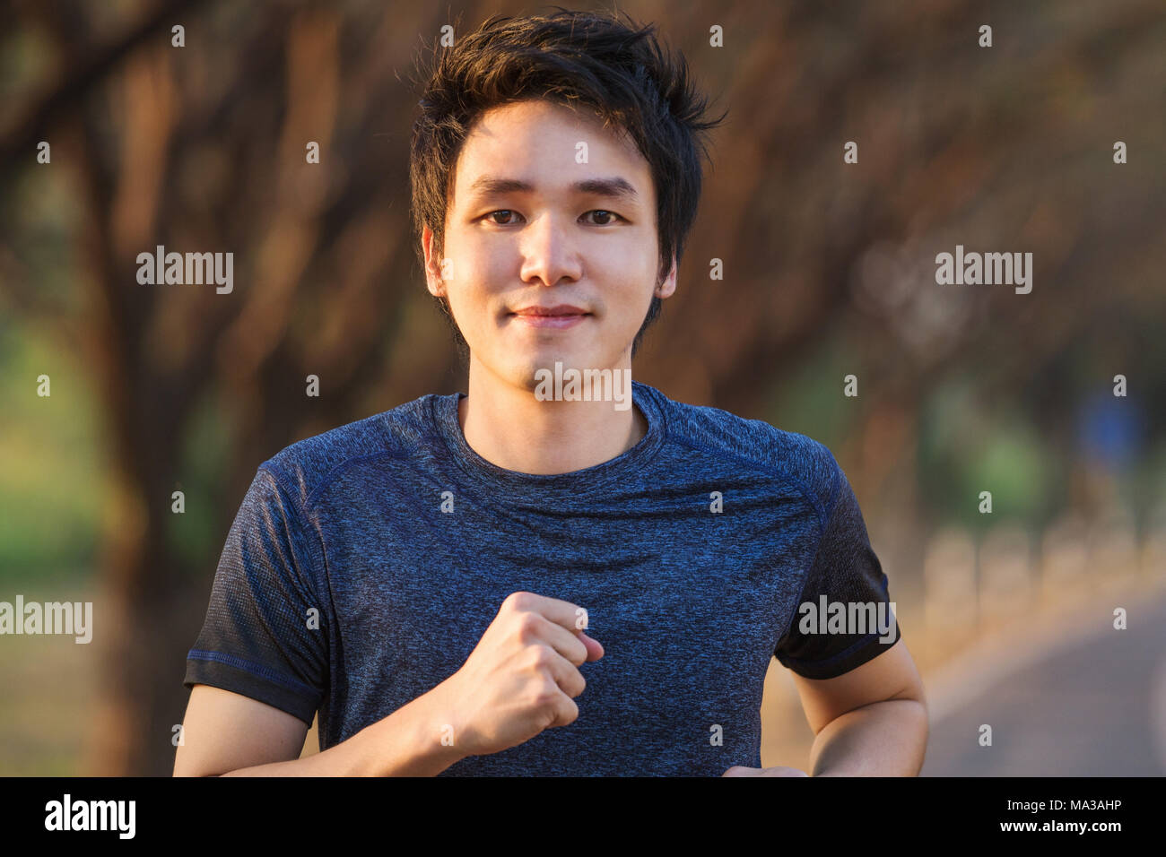 fitness man running in the park Stock Photo - Alamy