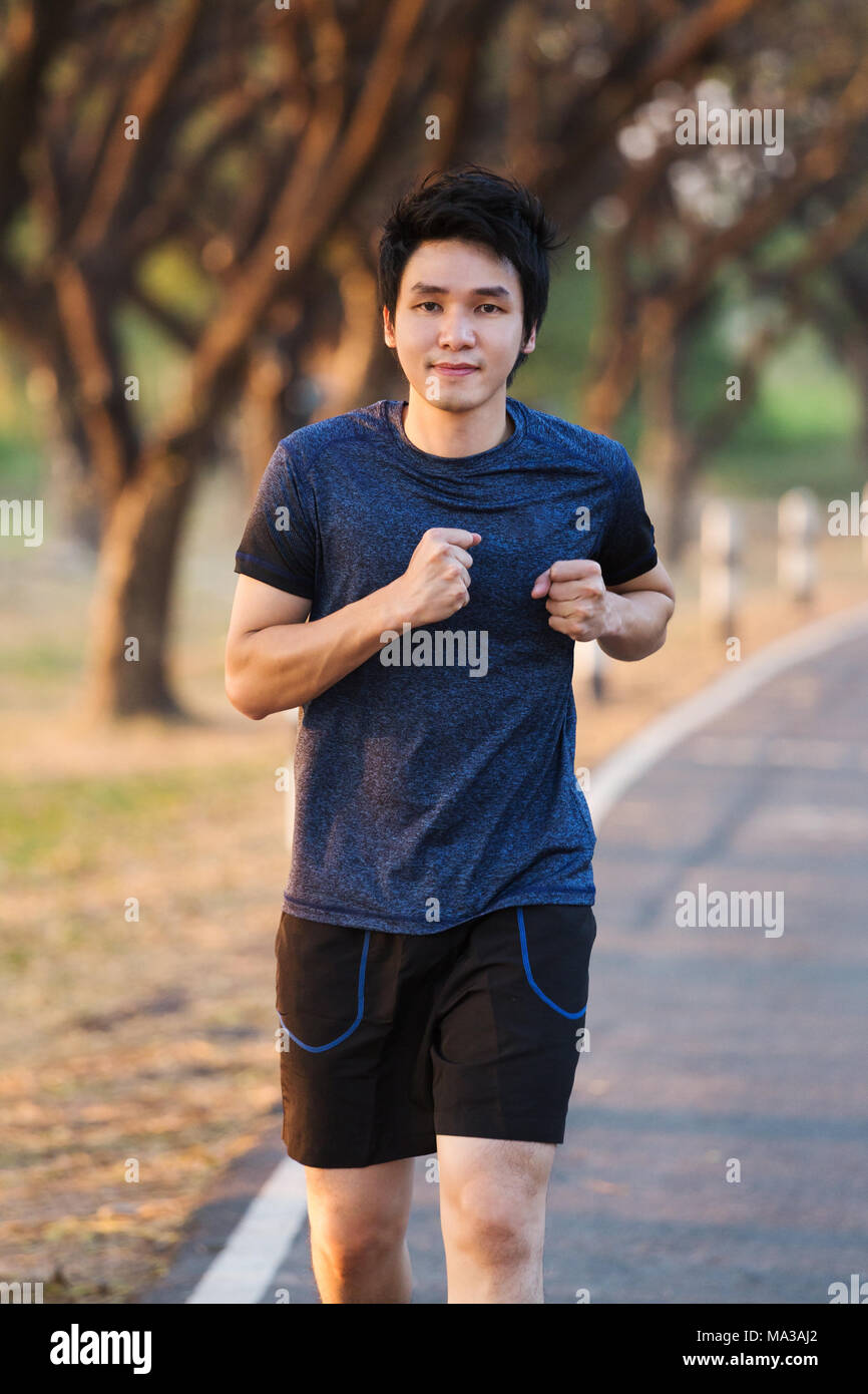 fitness man running in the park Stock Photo - Alamy