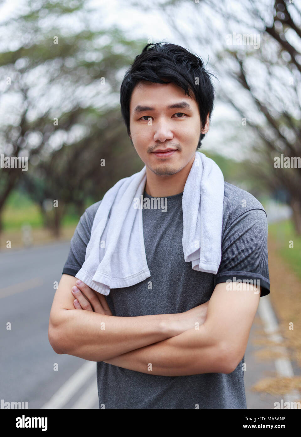 Asian man in sporty hi-res stock photography and images - Alamy