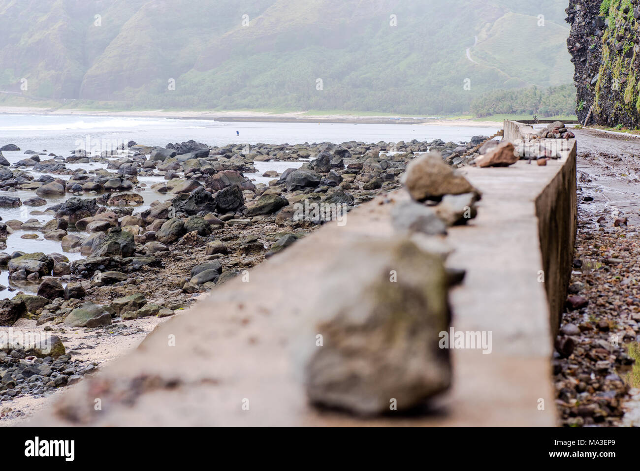 Stones lining at the side of the road Stock Photo - Alamy