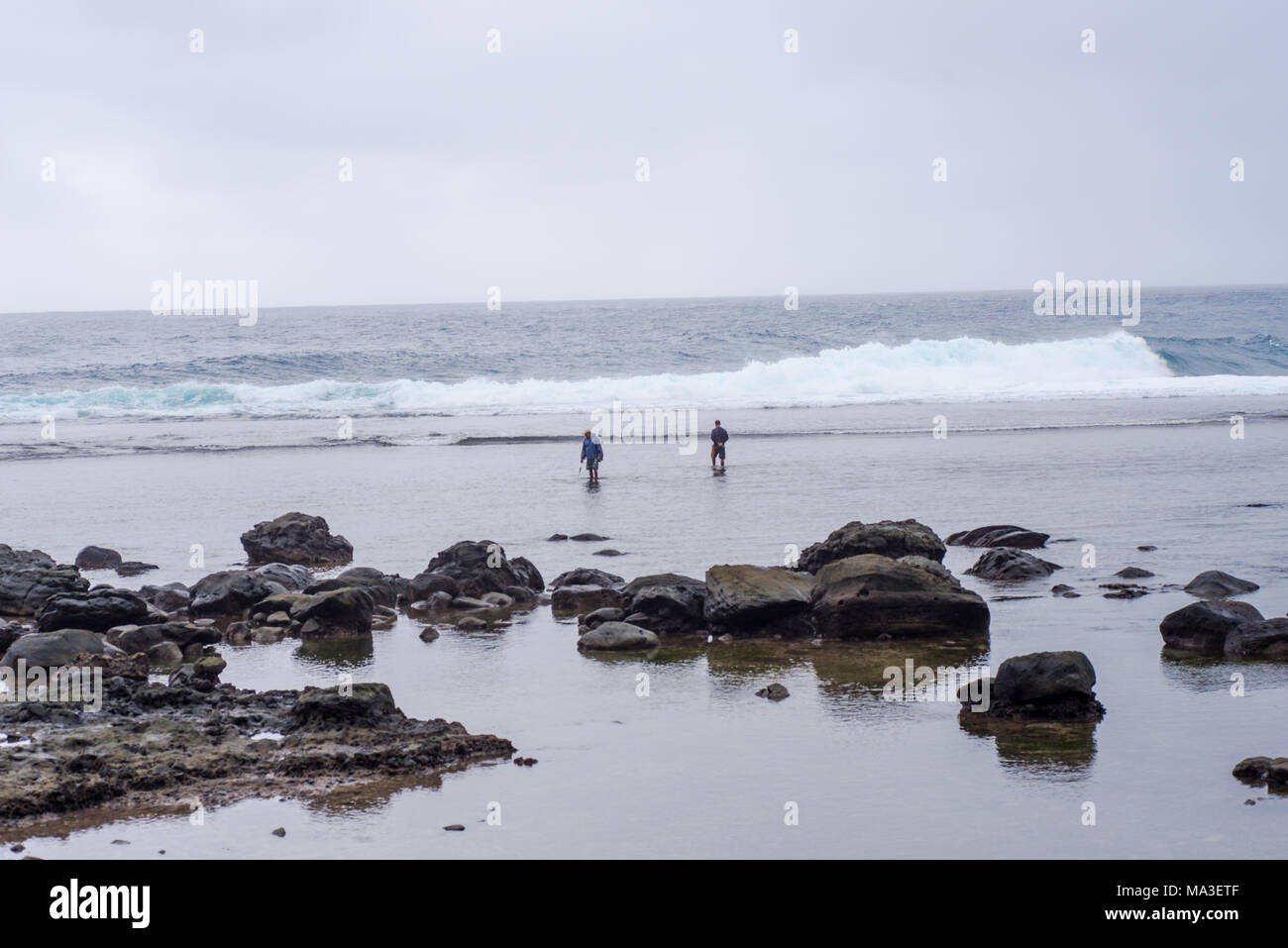 Local fishermen fishing at shore of Batanes, Philippines Stock Photo ...