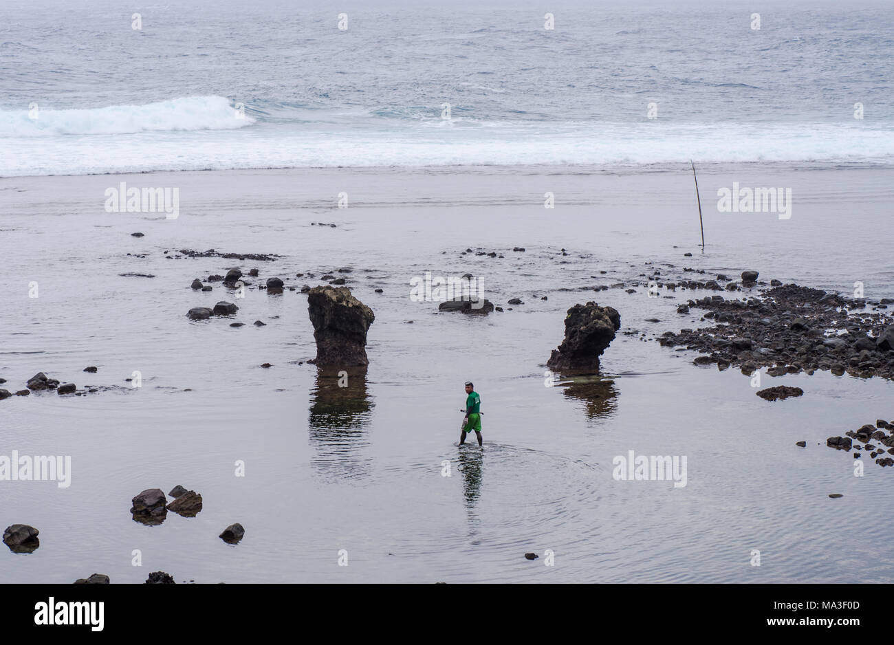 Local fishermen fishing at shore of Batanes, Philippines Stock Photo ...
