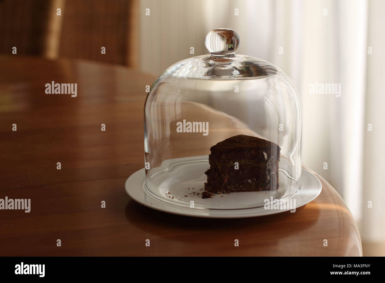 Cake under glass Stock Photo - Alamy
