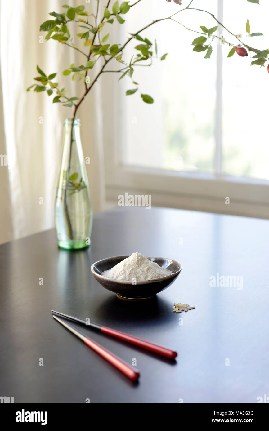 Rice flour, bowl, chopsticks, rice Stock Photo - Alamy