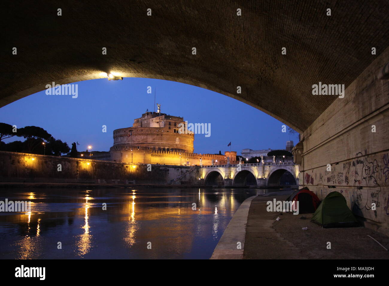 Homeless people sleeping under bridge hi-res stock photography and ...