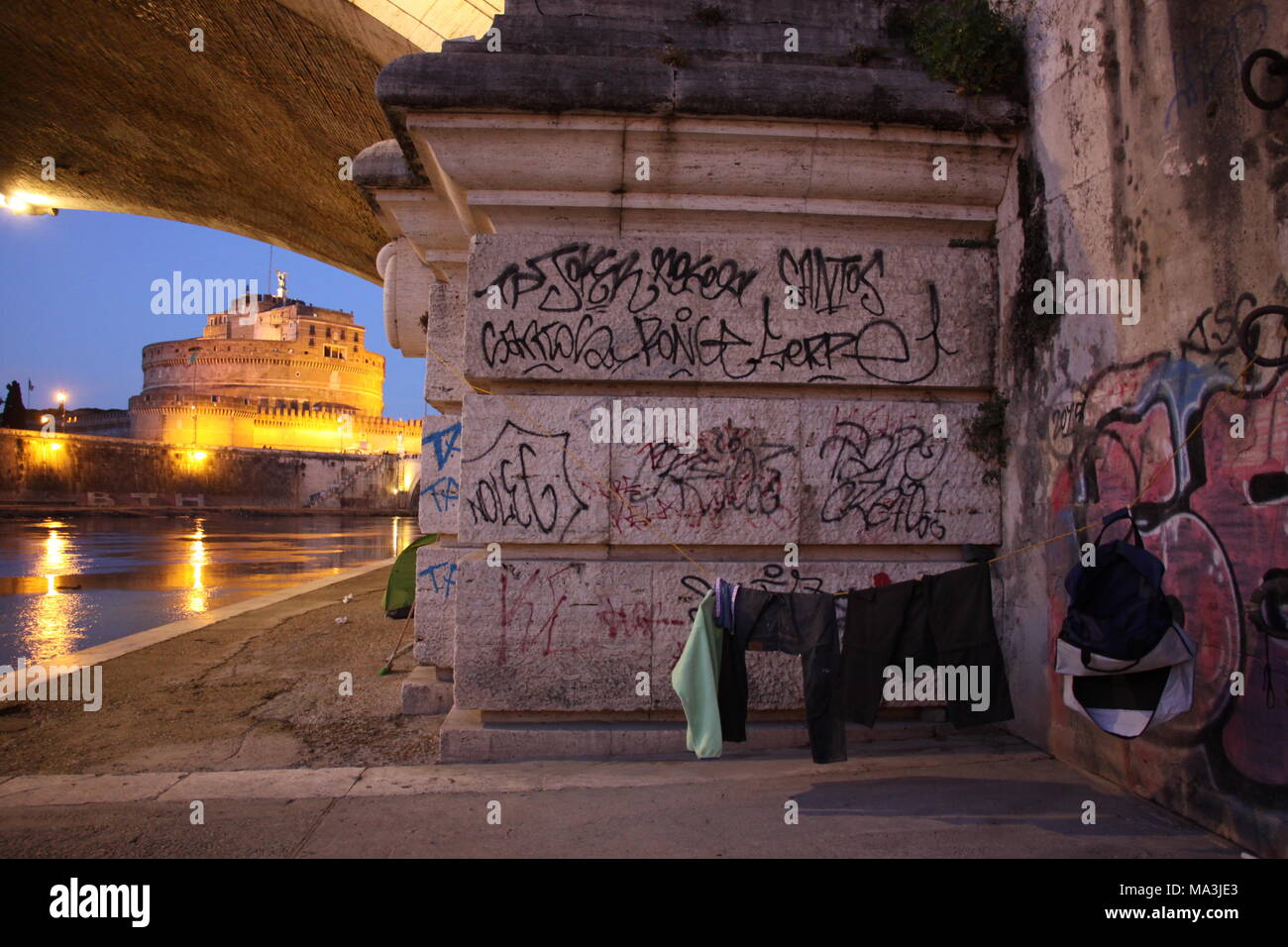 Homeless people sleeping under bridge hi-res stock photography and ...