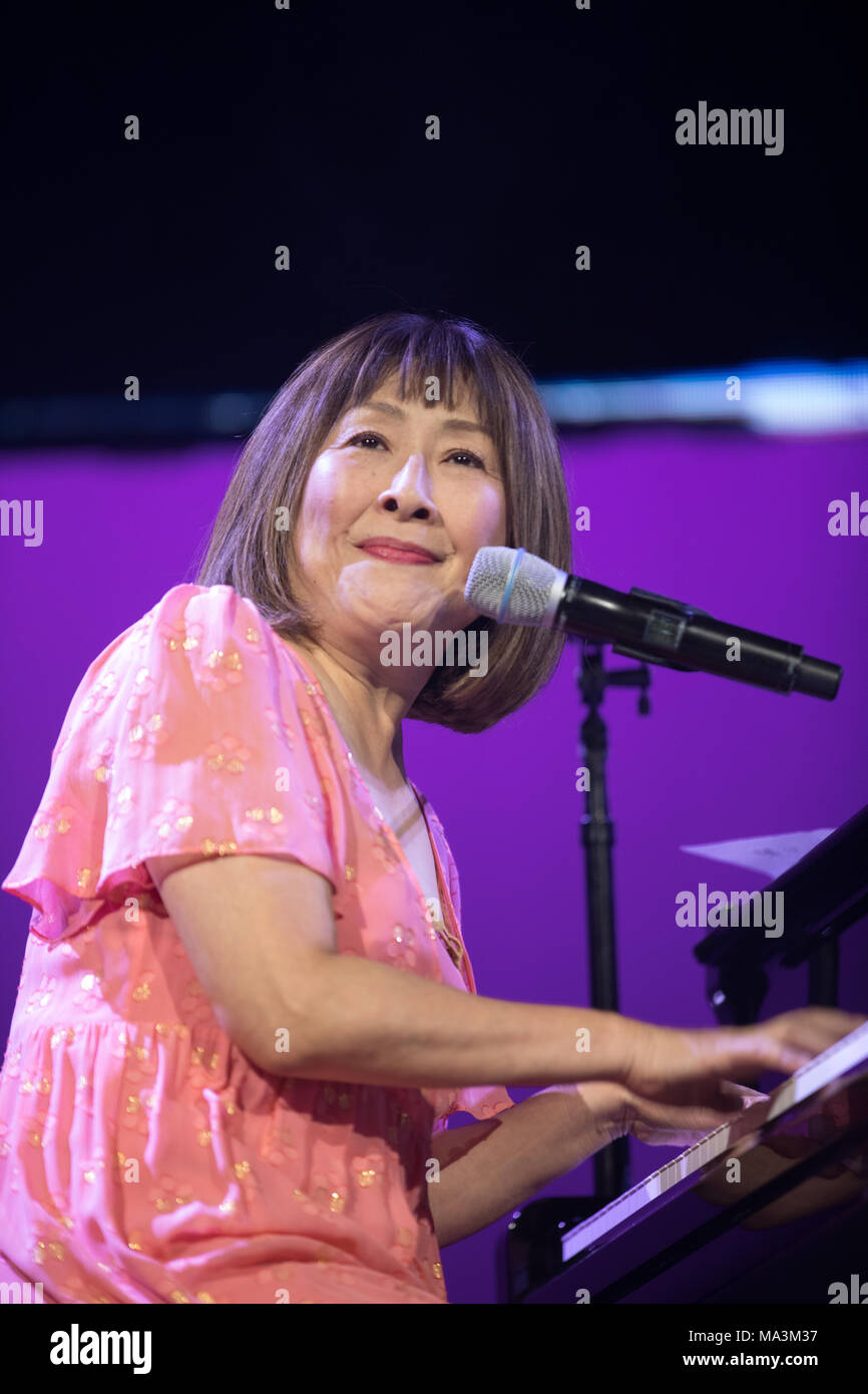 Akiko Yano performs at the piano at the Cherry Blossom Festival Opening ...